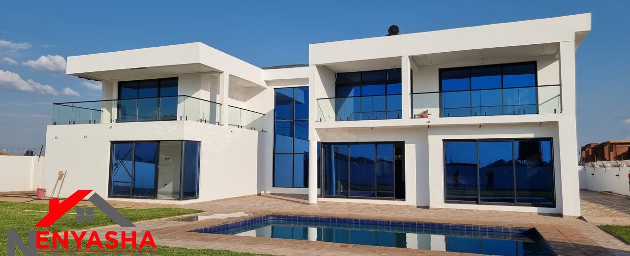 Nenyasha Projects – Alluminium & Sectional Doors