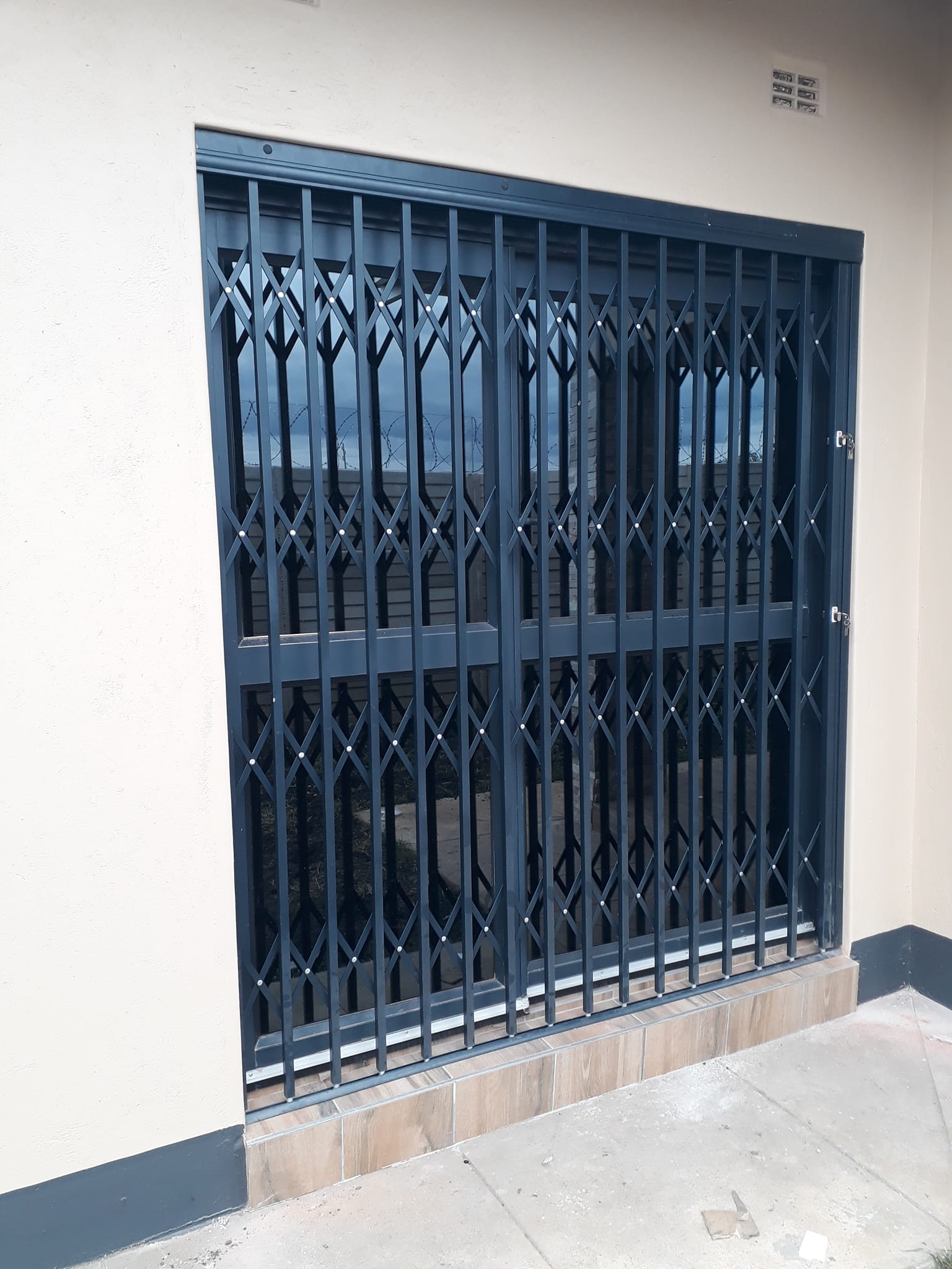 Nenyasha Projects – Alluminium & Sectional Doors